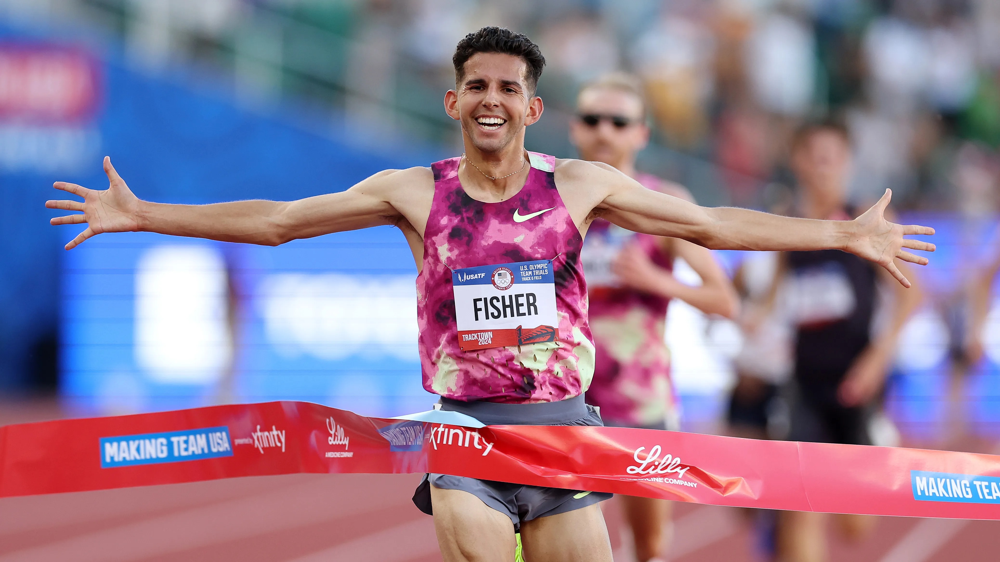 American Long-Distance Runner Fisher Sets World Record in Indoor 3000 ...